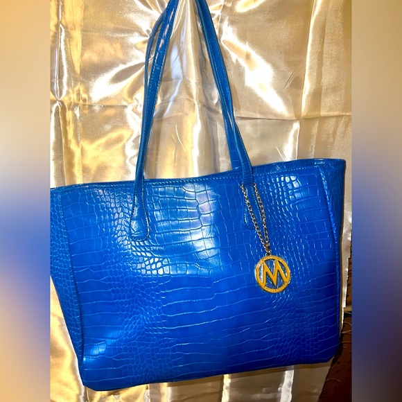 Bags | Sassy Blue Bag With Animal Print Texture | Poshmark